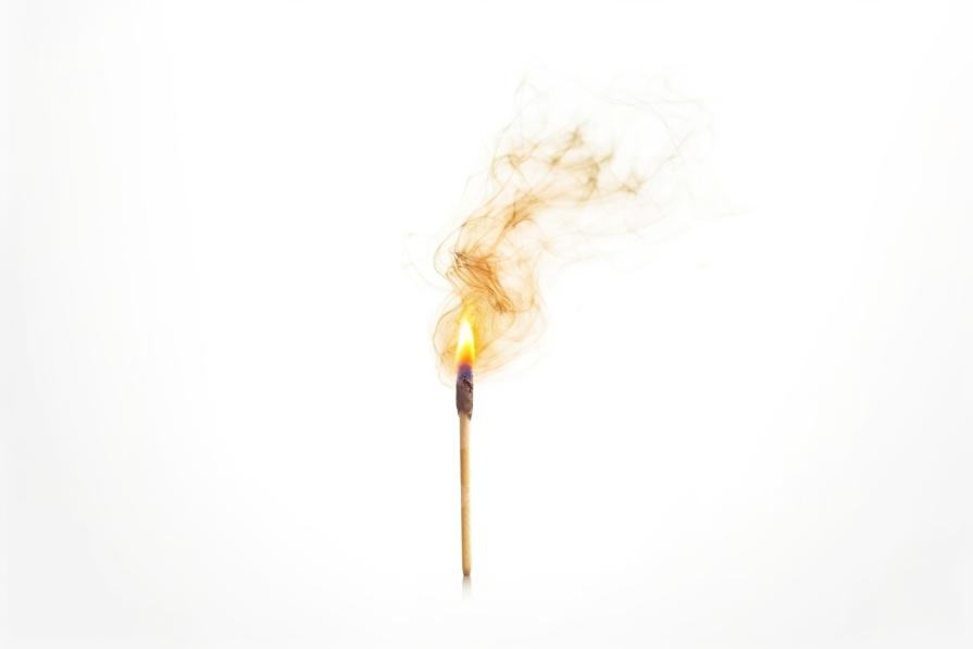 Close-Up Picture of a Lit Match on a White Background stock photo ...