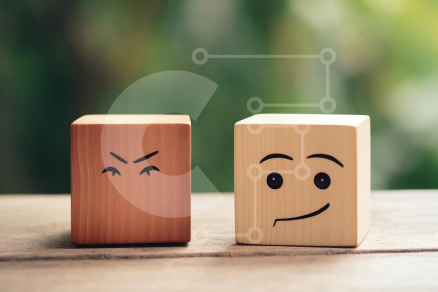 Wooden Blocks with Smiling and Frowning Faces - Creative Concept stock ...