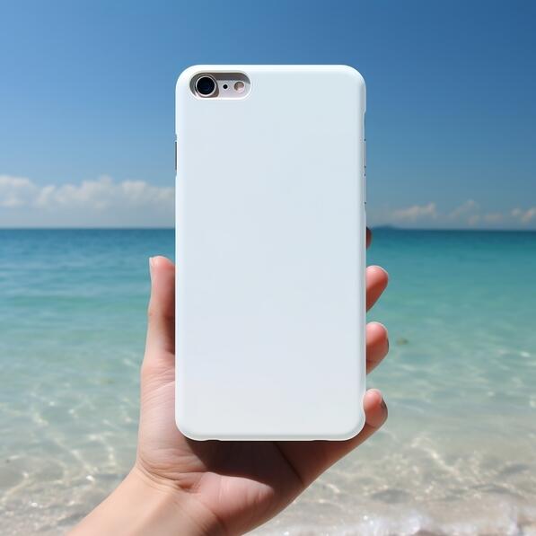 Download Empty white phone case held in front of the ocean Mockups ...