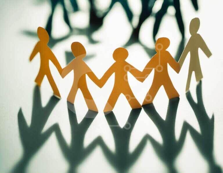 Group of Paper Cut-Out People Illustrating Teamwork and Friendship ...