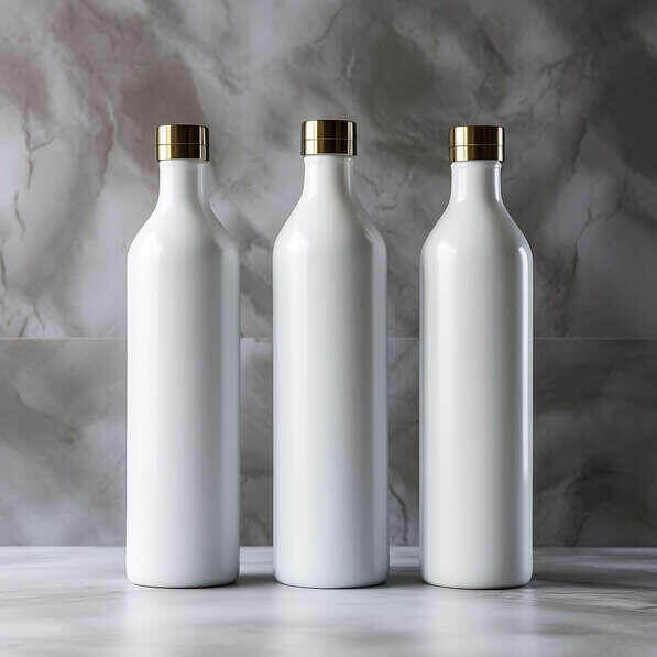 Download Elegant White Bottles with Gold Caps on Marble Surface Mockups ...