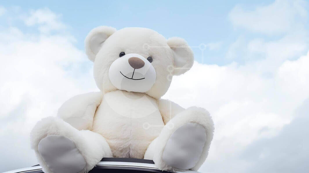 Adorable White Teddy Bear on Car Hood stock photo | Creative Fabrica