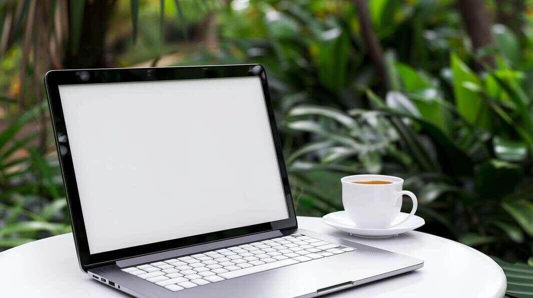 Download Open laptop computer and coffee on white table Mockups Online ...