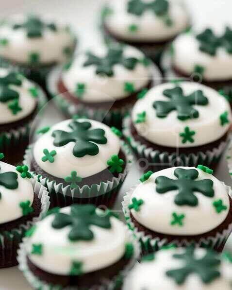 St. Patrick's Day Cupcakes with Green and White Shamrocks stock photo ...