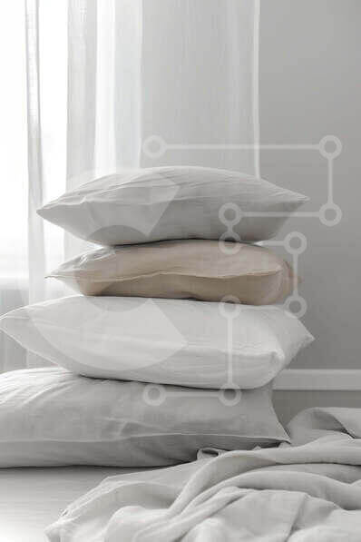 Neatly Arranged Stack of White Pillows stock photo | Creative Fabrica