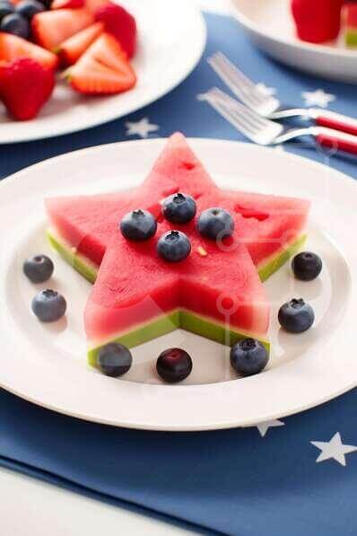 Star-Shaped Watermelon with Berries for 4th of July stock photo ...