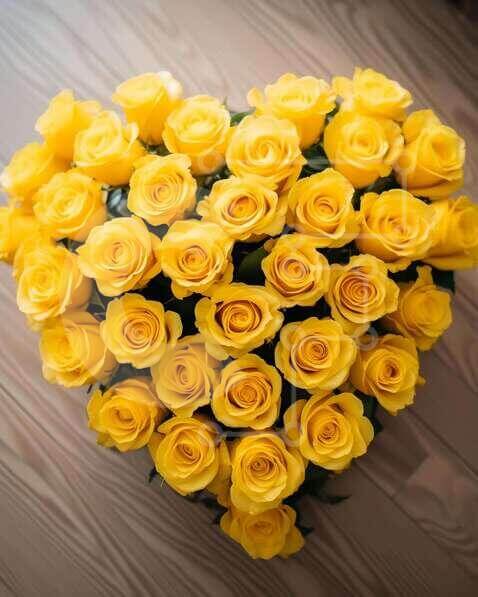 Heart-Shaped Yellow Rose Arrangement stock photo | Creative Fabrica