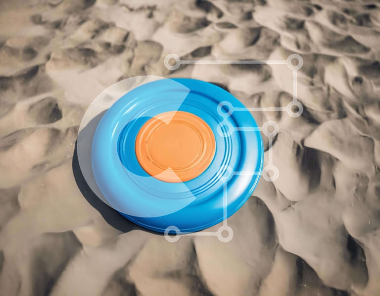 Download Blue and Orange Frisbee on Sand Stockphotos Online - Creative ...