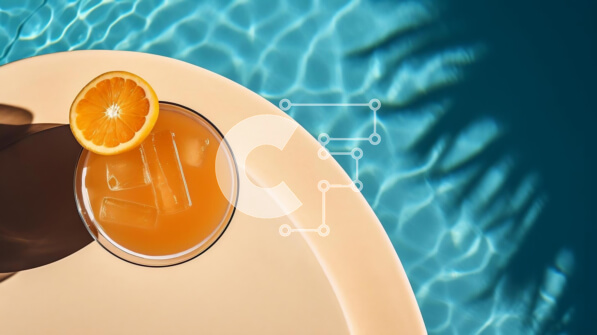 Refreshing Glass of Orange Juice by the Pool stock photo | Creative Fabrica