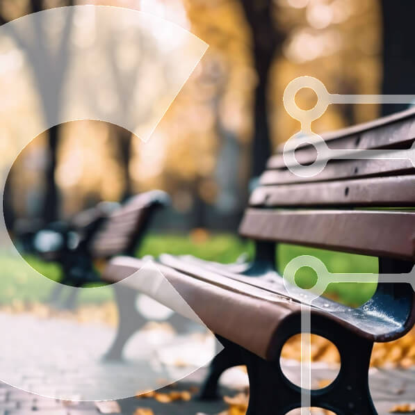 Autumn Scene: Park Bench Surrounded by Scattered Leaves stock photo ...