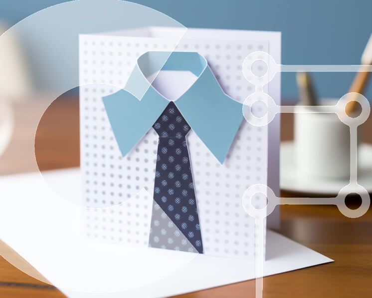 Intricately Cut Paper Tie Greeting Card with Cup stock photo | Creative ...