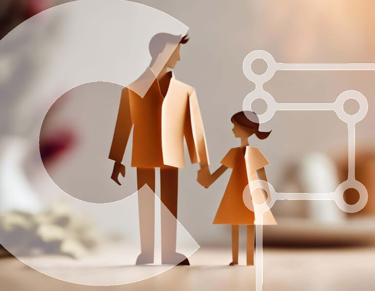 Handmade Paper Cut-out Couple in Front of Orange Table stock photo ...