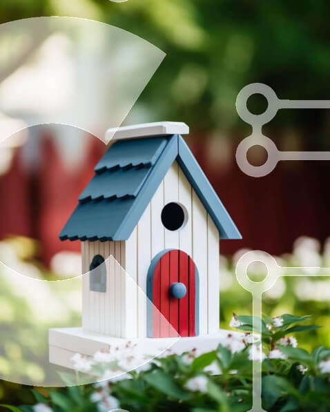 Colorful Birdhouse in Nature Setting stock photo | Creative Fabrica
