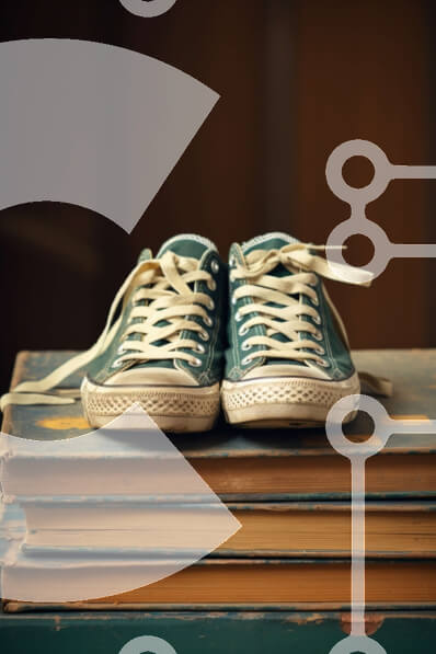 Vintage Green Converse Sneakers on Old Books stock photo | Creative Fabrica