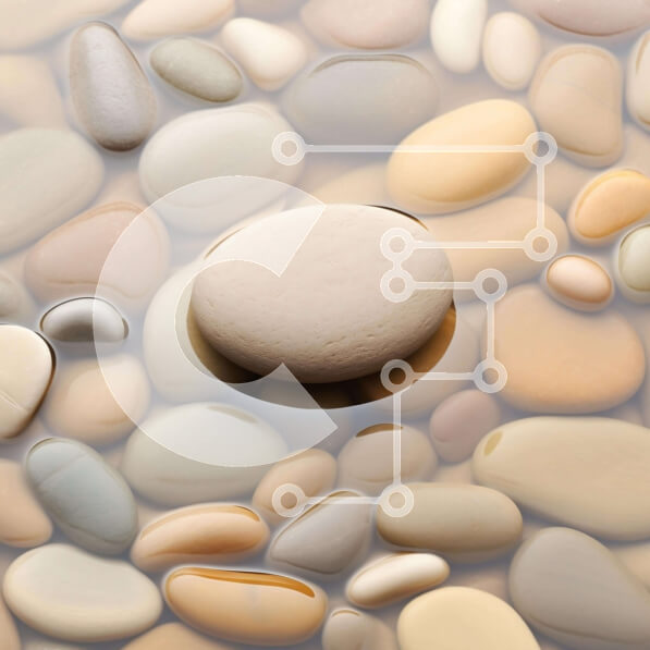 Tranquil Scene of Pebbles on Water with Contrasting Rock stock photo ...