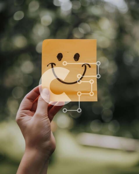 Smiley Face Post-It Note Surrounded by Nature stock photo | Creative ...