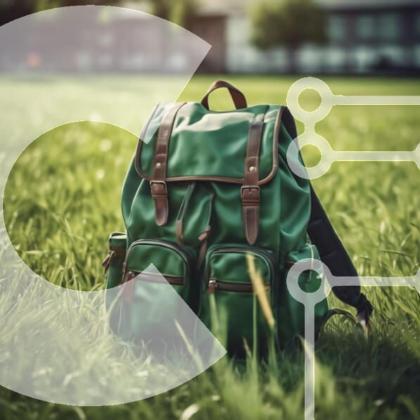 Green Backpack in the Grass with Brown Leather Straps stock photo ...