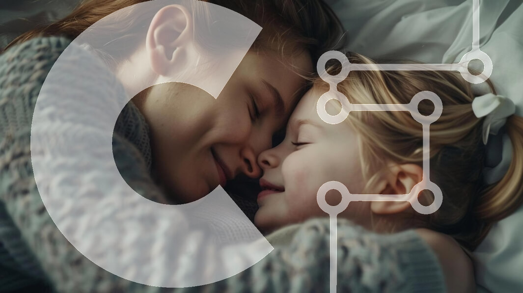 Mother and Daughter Cuddling in Bed stock photo | Creative Fabrica