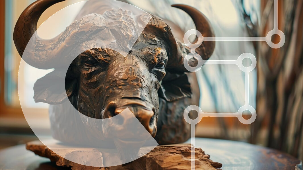 Bronze Buffalo Head Statue Displayed on Wooden Table stock photo ...
