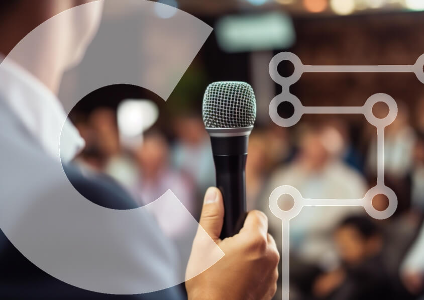 Man Speaking at Event with Microphone stock photo | Creative Fabrica