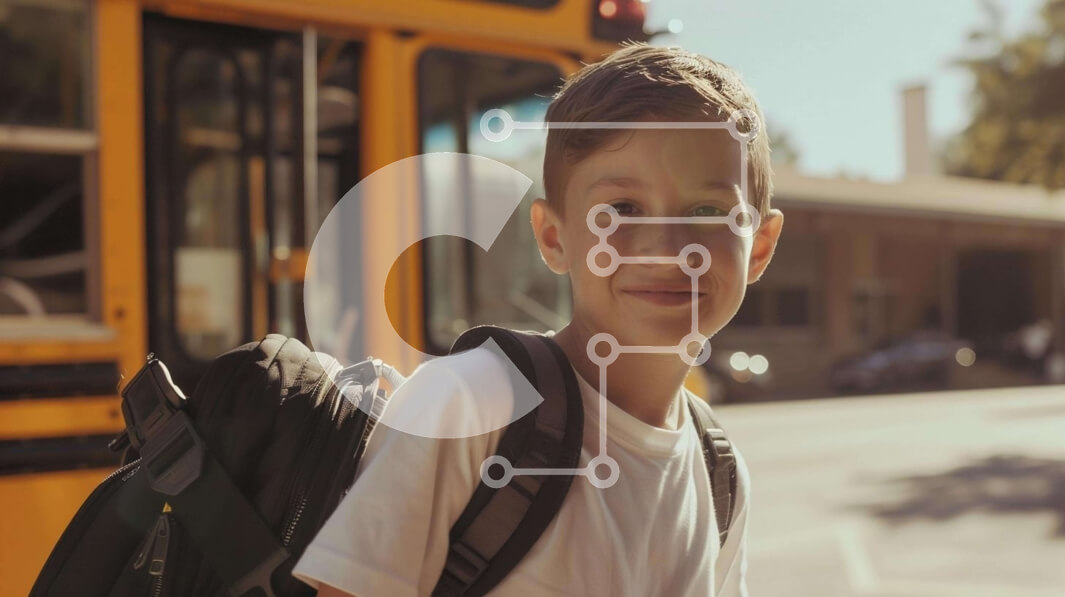 Young Boy and Orange School Bus stock photo | Creative Fabrica