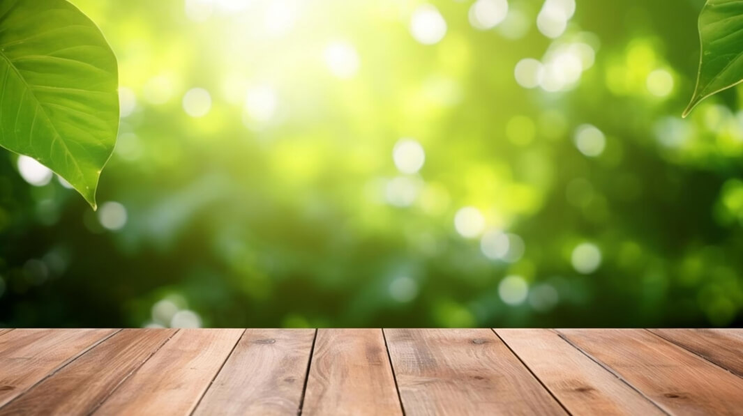 Download Wooden Table with Green Leaves Background Backgrounds Online ...