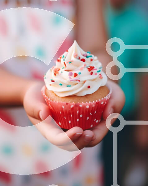 Gruppe genießt Cupcake mit Streuseln Stockfoto | Creative Fabrica