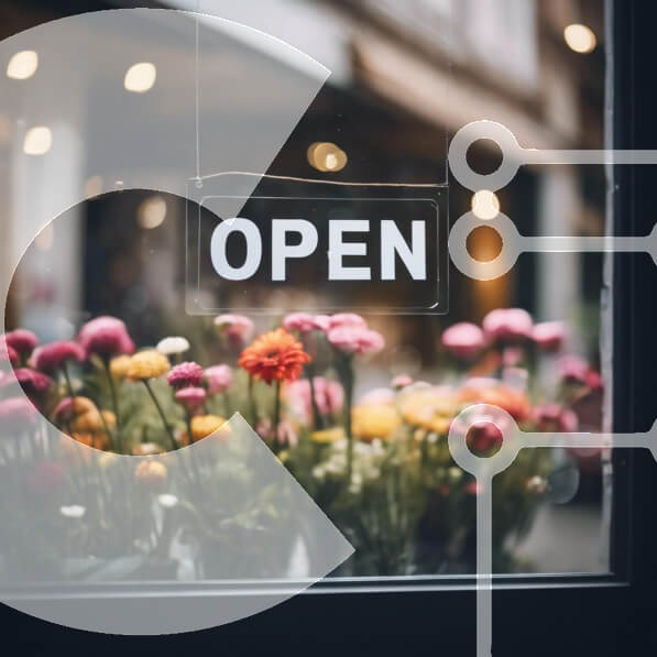 Charming Window Display of Flowers with Open Sign and Potted Plants ...