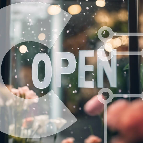 Vibrant Business Window Display with Flowers and Open Sign stock photo ...