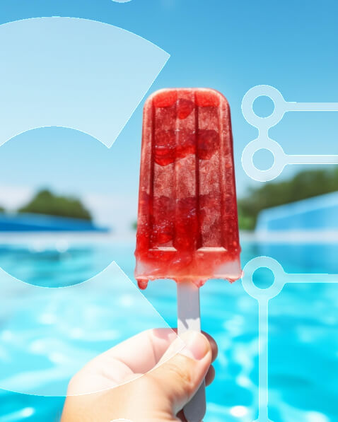 Enjoying a Red Ice Cream Popsicle by the Pool stock photo | Creative ...