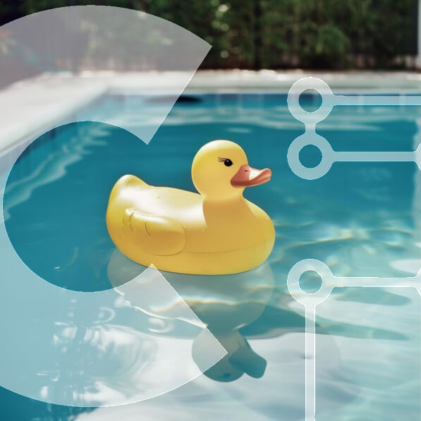 Playful Yellow Rubber Duck Floating in a Pool stock photo | Creative ...