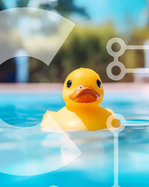 Yellow Rubber Duck in Pool with Chairs and Trees stock photo | Creative ...