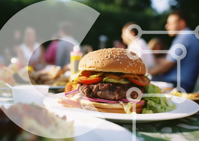 Burger on Dining Table with People Outdoors stock photo | Creative Fabrica