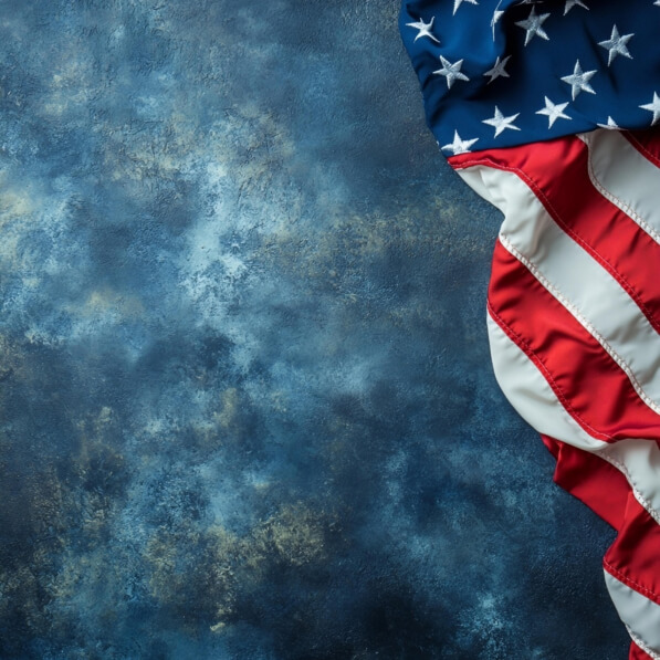 Download American Flag Draped on Blue Background Backgrounds Online ...