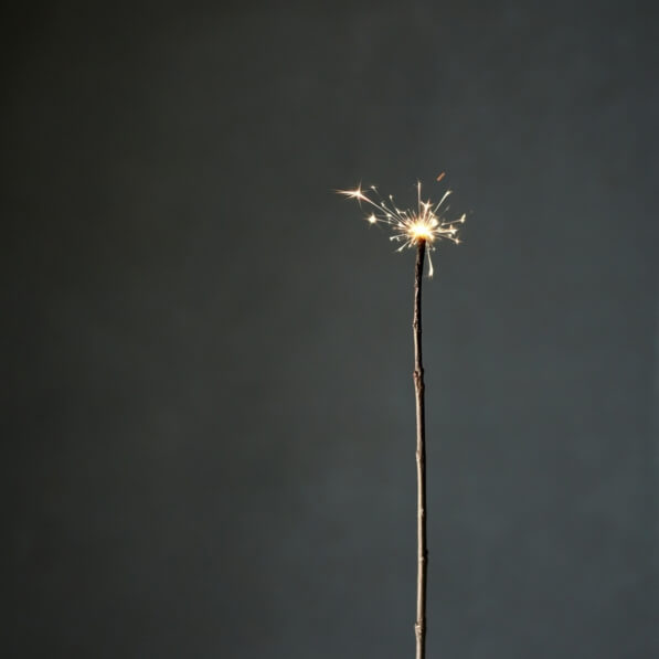 Download Sparkling Stick Against Dark Background Backgrounds Online ...