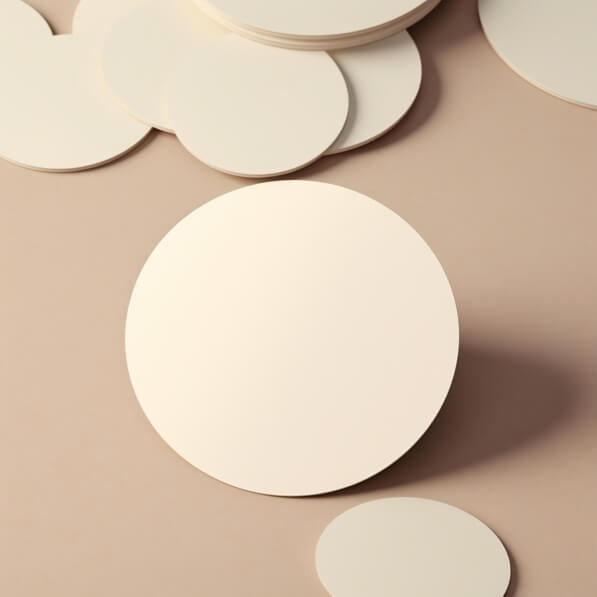 Download Cream-colored Round Paper Circles on Beige Surface Mockups ...