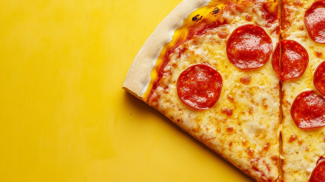 Download Slice of Pepperoni Pizza on Yellow Background Backgrounds Online - Creative Fabrica