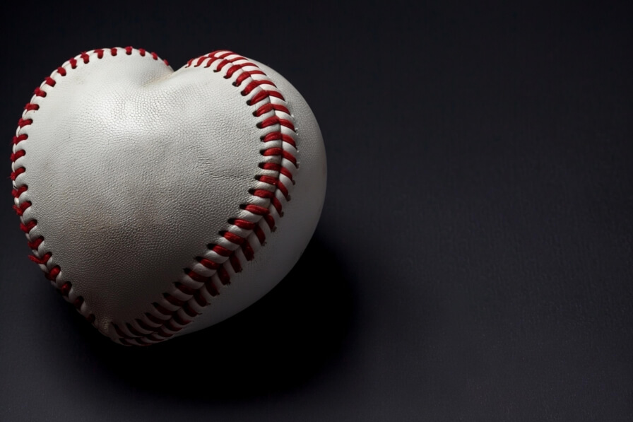 Download Heart-shaped Baseball on Dark Background Backgrounds Online ...