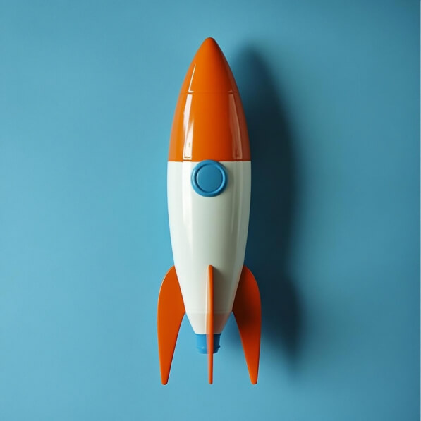 Download Colorful Toy Rocket against Blue Background Backgrounds Online ...